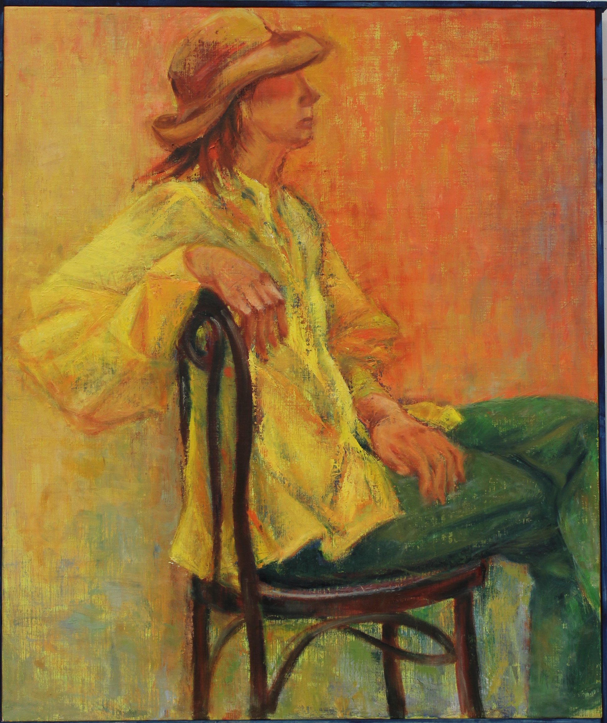 黄色いブラウスの人